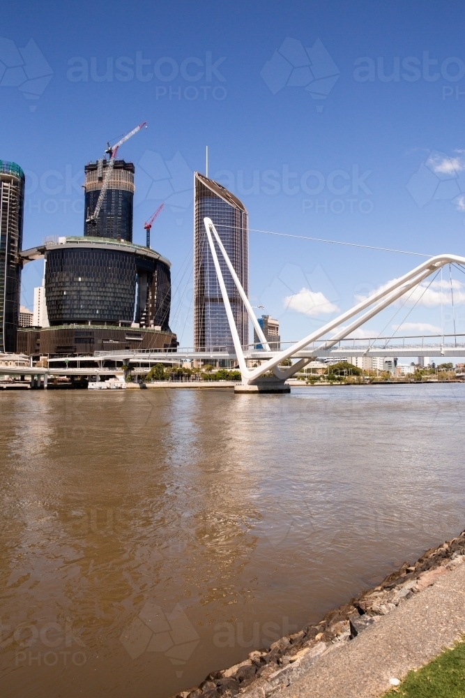 Image of Brisbane river with reflections of bridges and buildings on a ...
