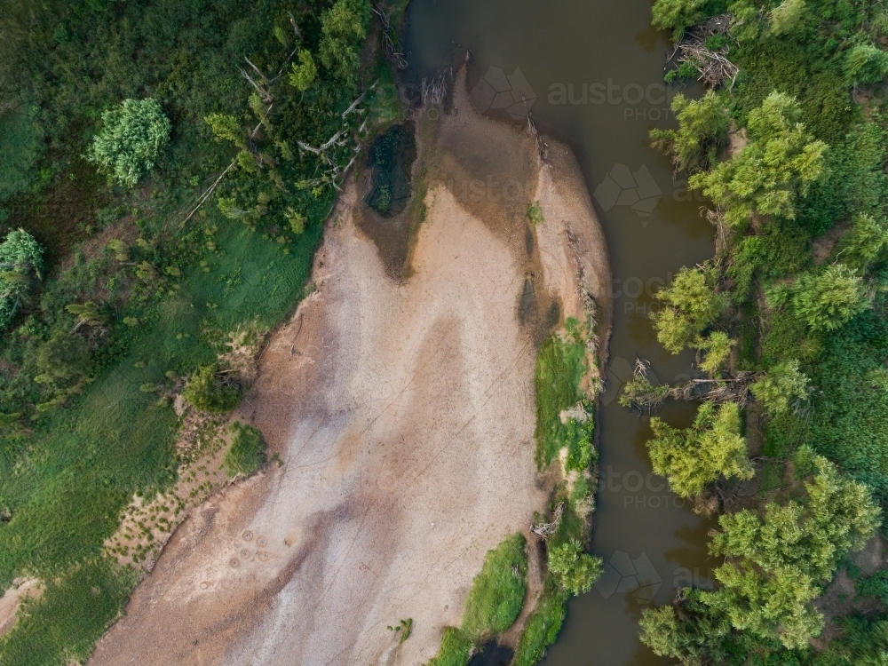 Image of brown bend in Hunter river with rocky mud sand bar seen from ...