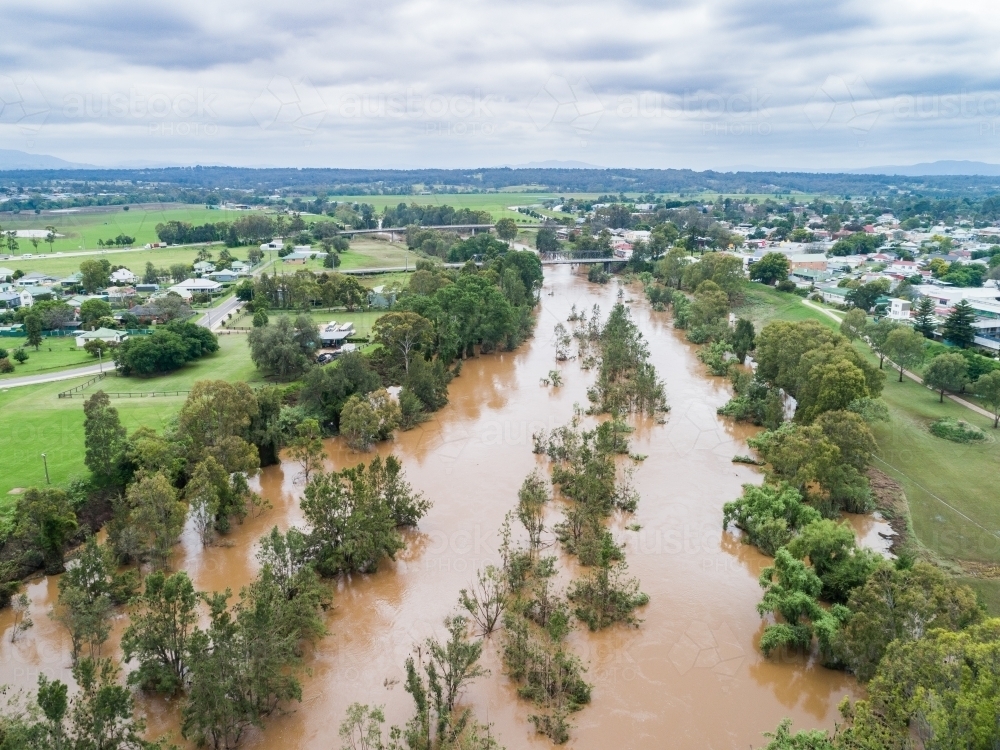 Image of Brown floodwaters in Hunter River water falling after flood ...