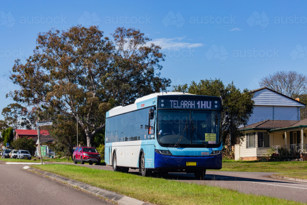 Image of Bus and cars on road in Maitland - Austockphoto