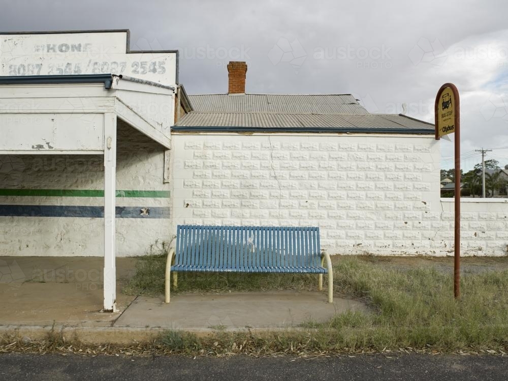 Image of bus stop at old butcher shop - Austockphoto