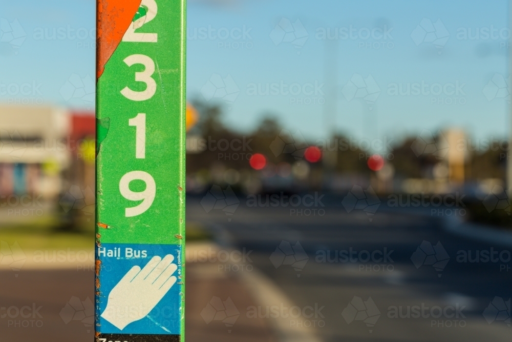 Image of Bus stop on suburban street - Austockphoto