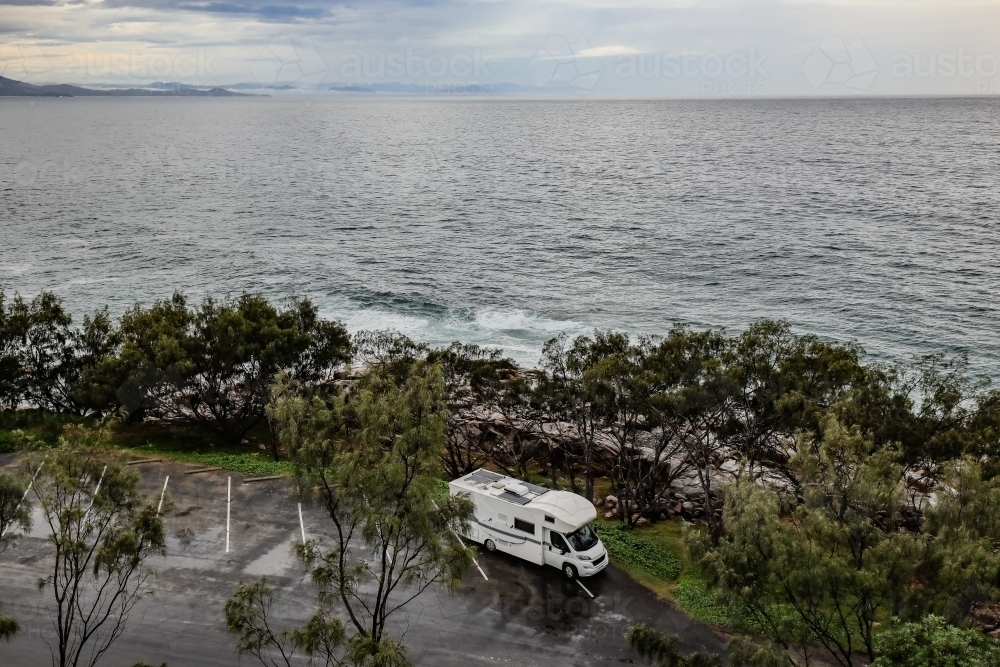 Image of Camper van parked by the beach at Arakoon NSW - Austockphoto