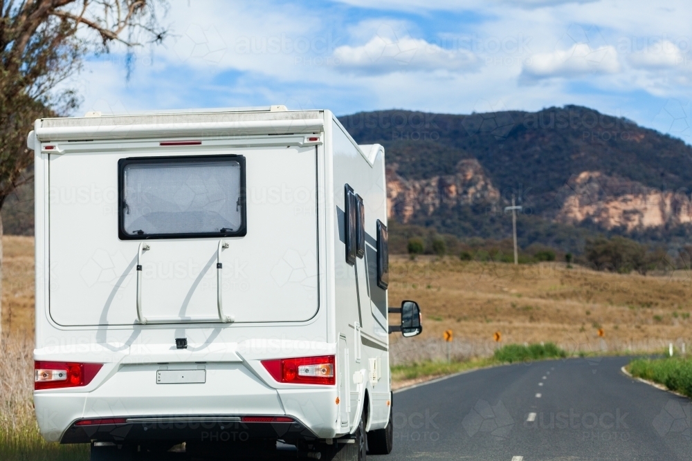 Image of Campervan on rural country road doing road trip holiday ...
