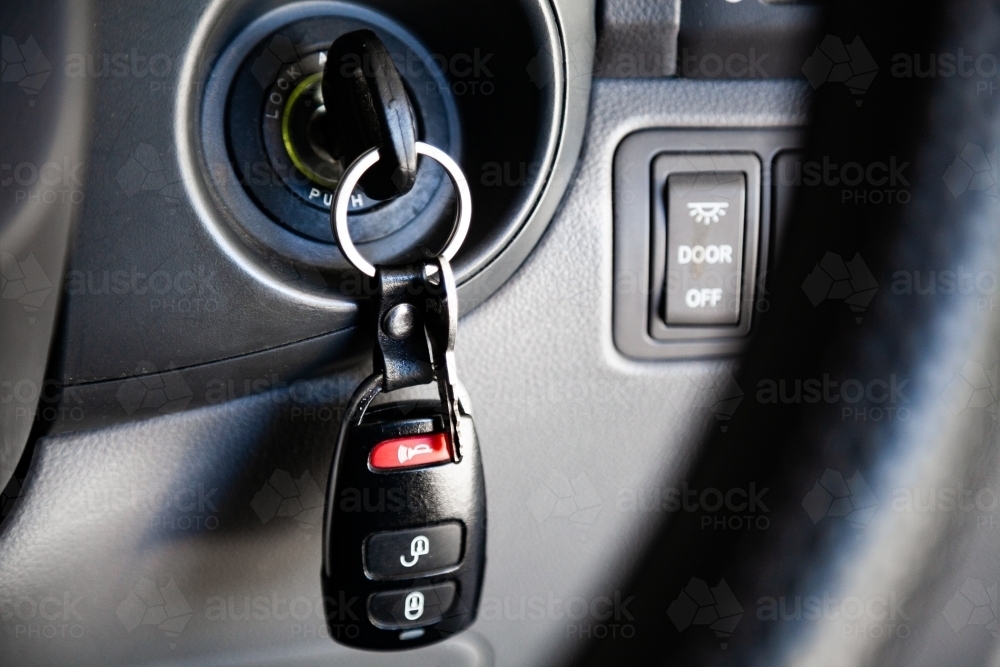 Image of Car keys in ignition of car - Austockphoto