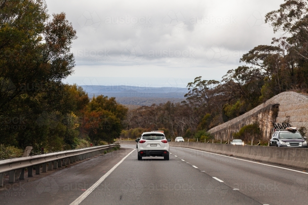 Image of Car travelling down highway road in Blue Mountains on overcast ...
