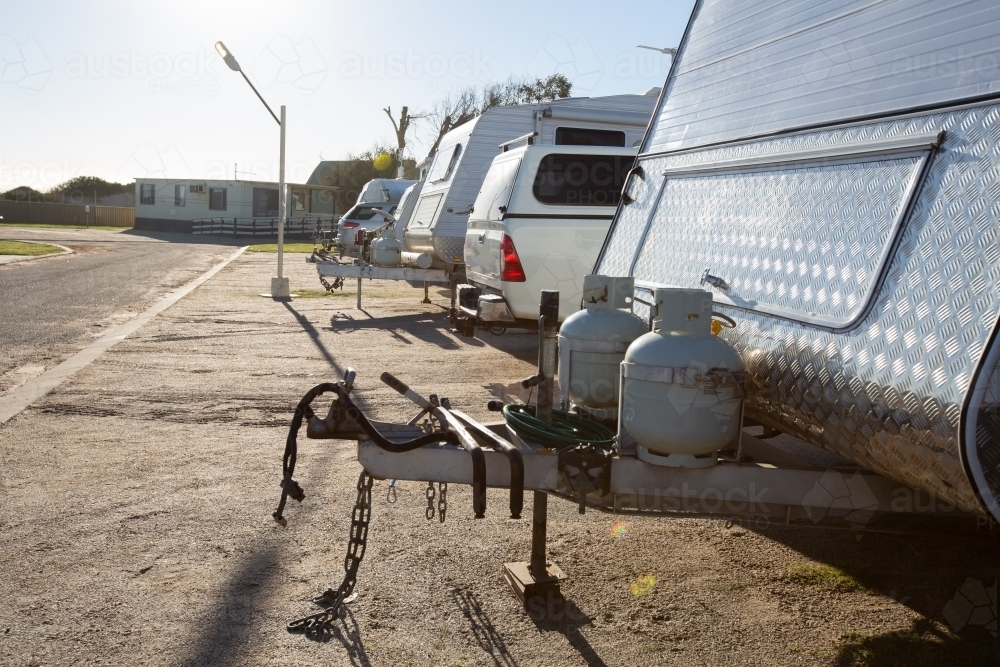 Image of Caravans parked in a caravan park - Austockphoto