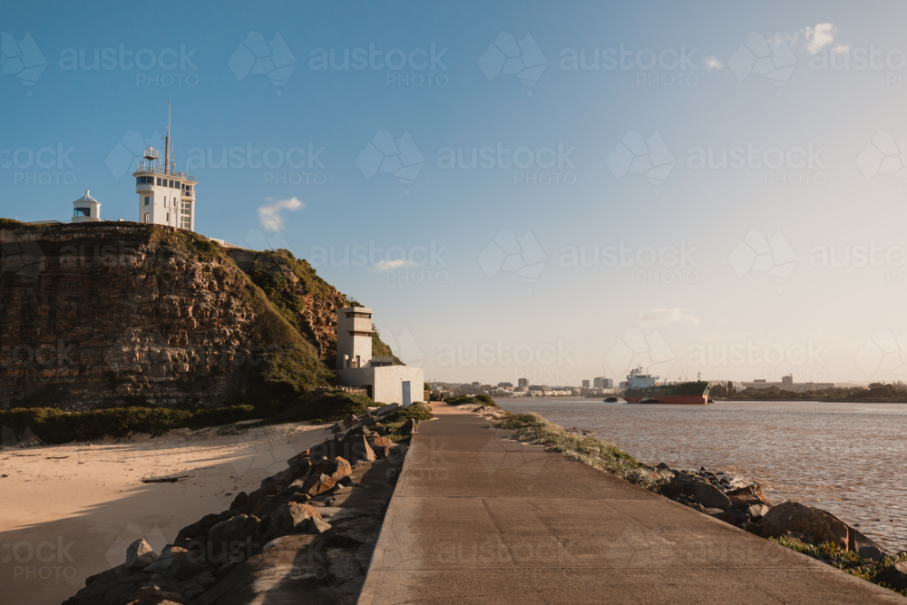 Image of Cargo ship escorted by tug boats as it leaves Newcastle Port ...