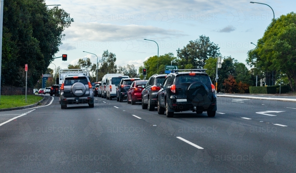 Image of Cars in a queue at red traffic lights in Sydney on commute ...