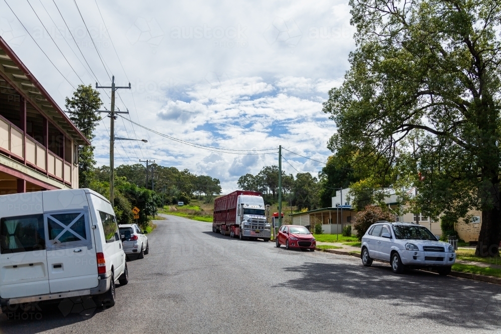 Image of Cars parked outside pub on main street of tiny country town ...