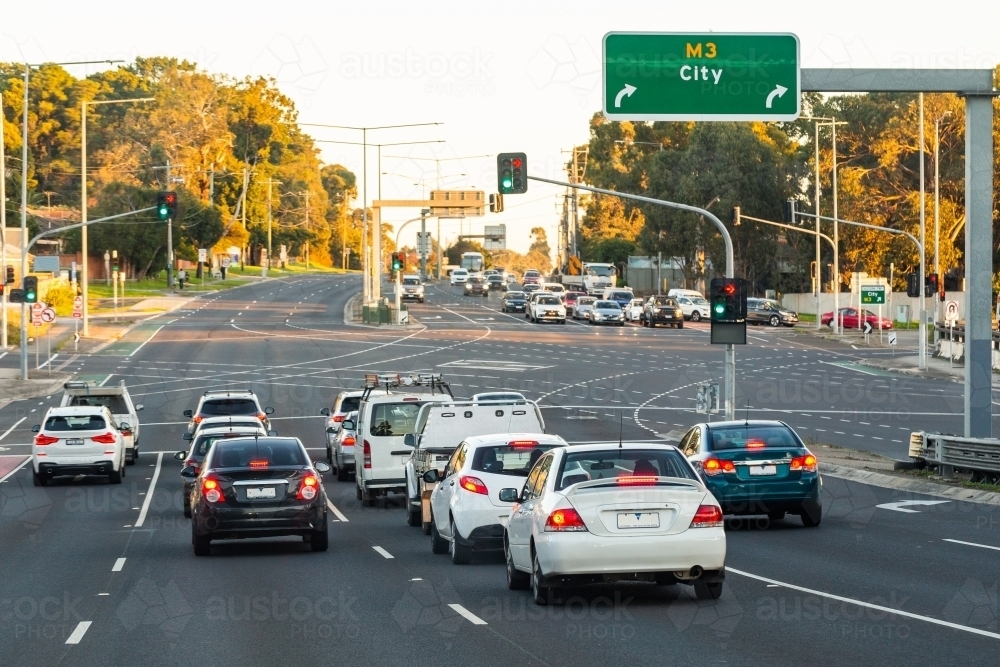 Image of Cars stopped at city traffic lights - multi lane intersection ...