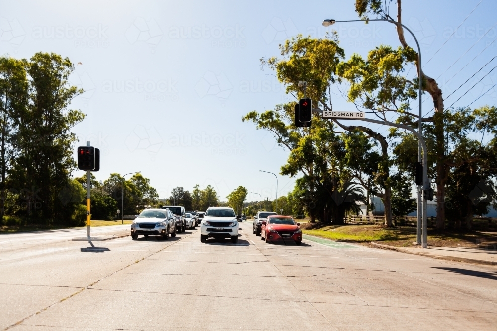 Image of Cars waiting at traffic lights at intersection in Singleton ...