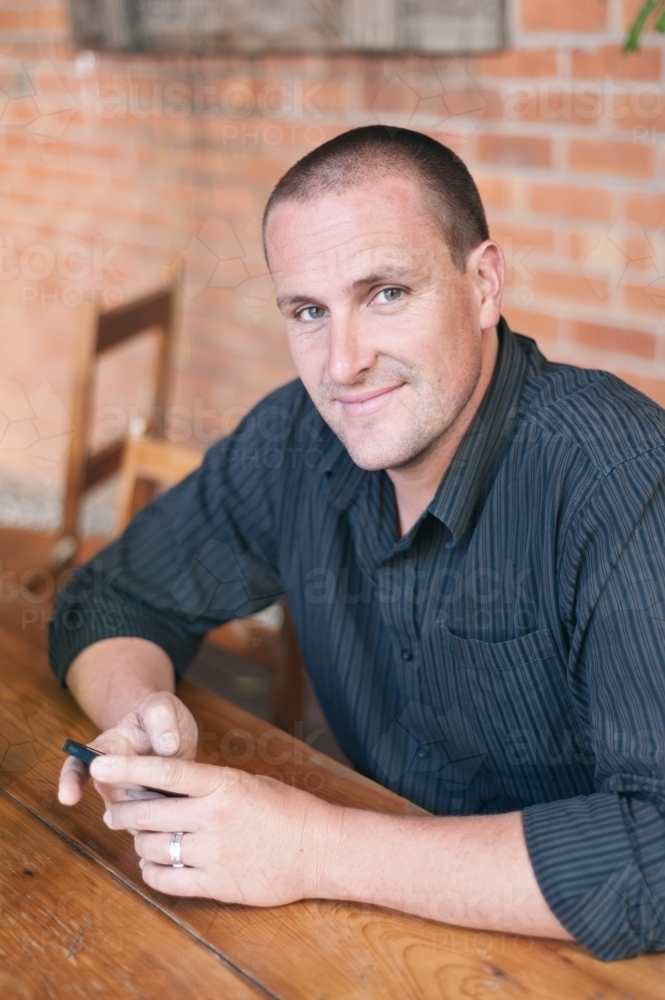 Image of Casual portrait of a 30-something man - Austockphoto