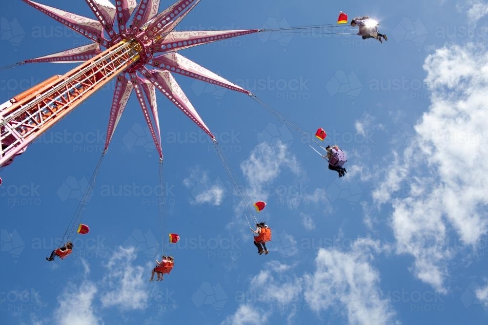Image of Chair swing at the Sydney Royal Easter Show - Austockphoto