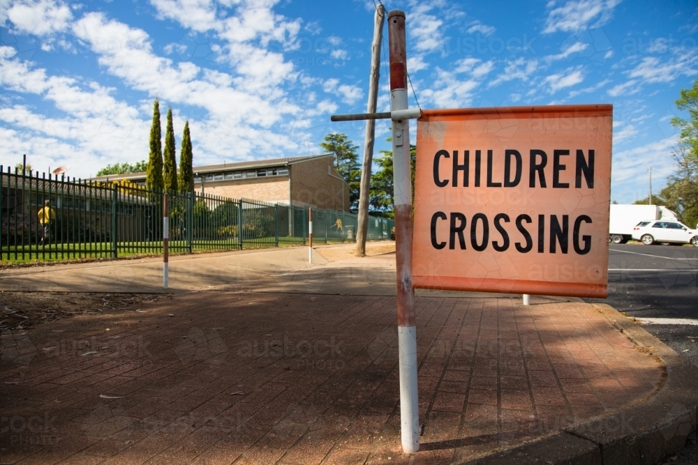 Image of Children crossing sign at a school - Austockphoto