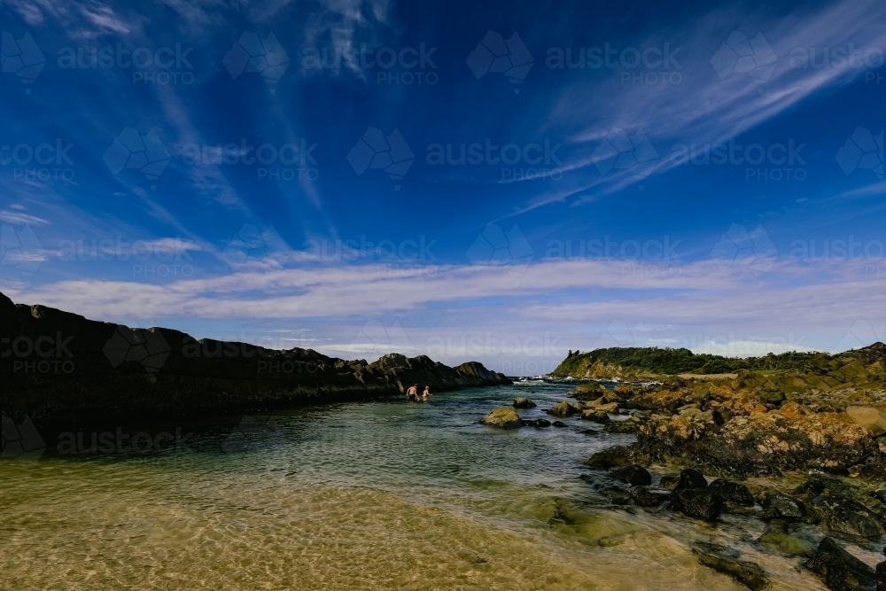 Image of Children swimming at The Tanks tourist attraction natural rock ...
