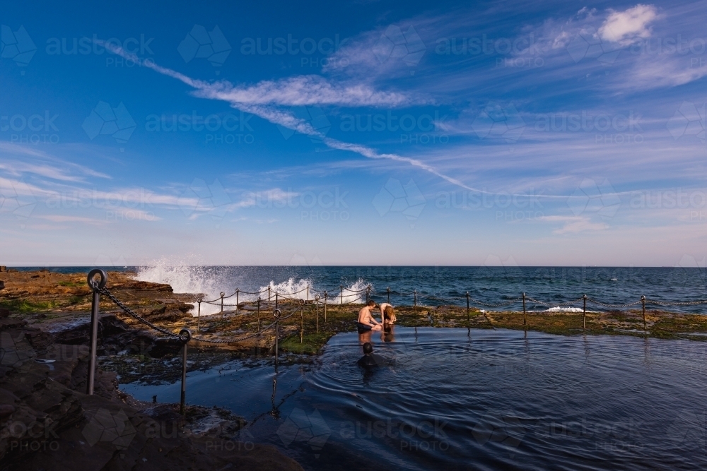 Image of Children swimming in the Bogey Hole, historic man-made rock ...