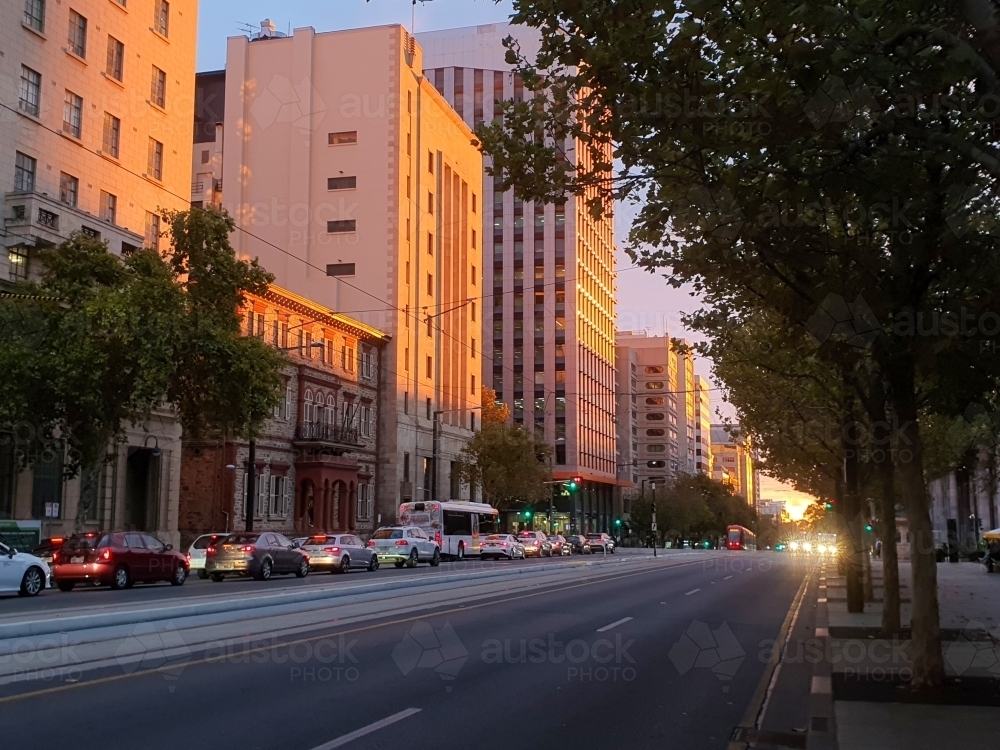 Image of city buildings in late afternoon light - Austockphoto