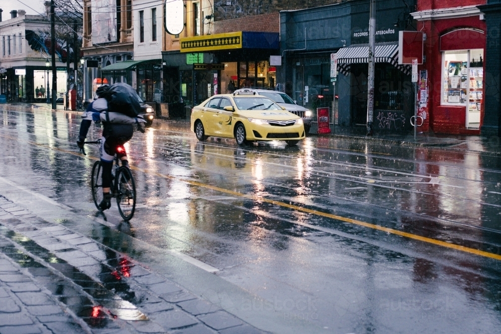 Image of City street on a rainy day - Austockphoto