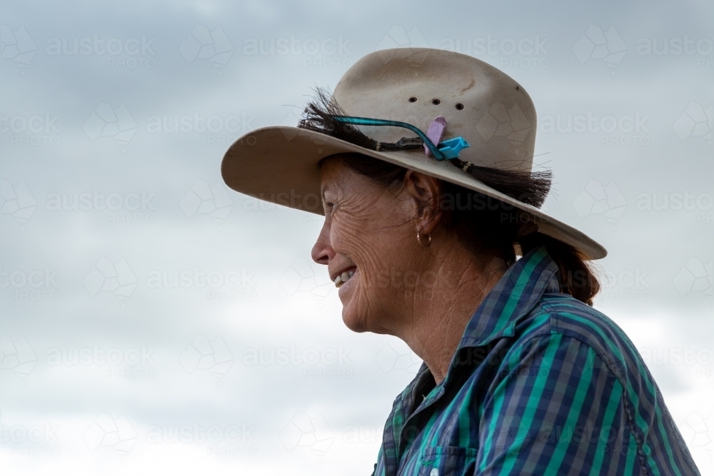 Image of Close-up of country woman in her sixties smiling. - Austockphoto