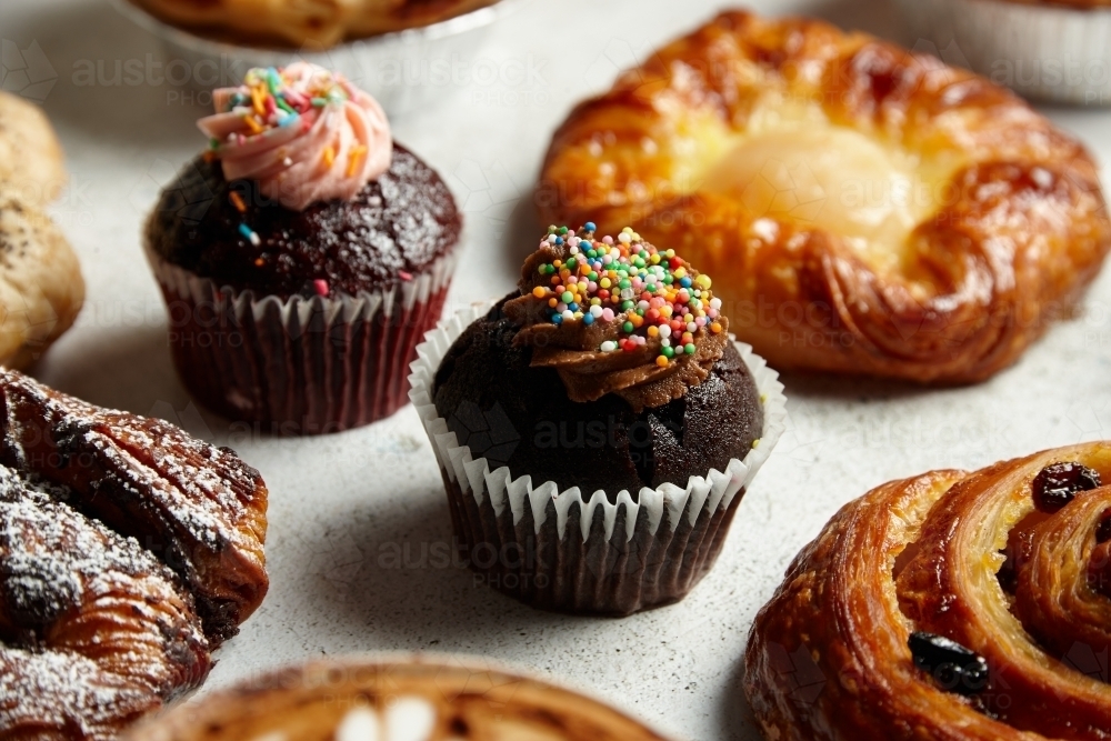 Image of Close up of cupcakes and pastries - Austockphoto