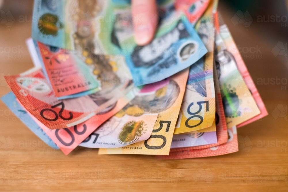 Image of close up of different Australian bank notes - Austockphoto