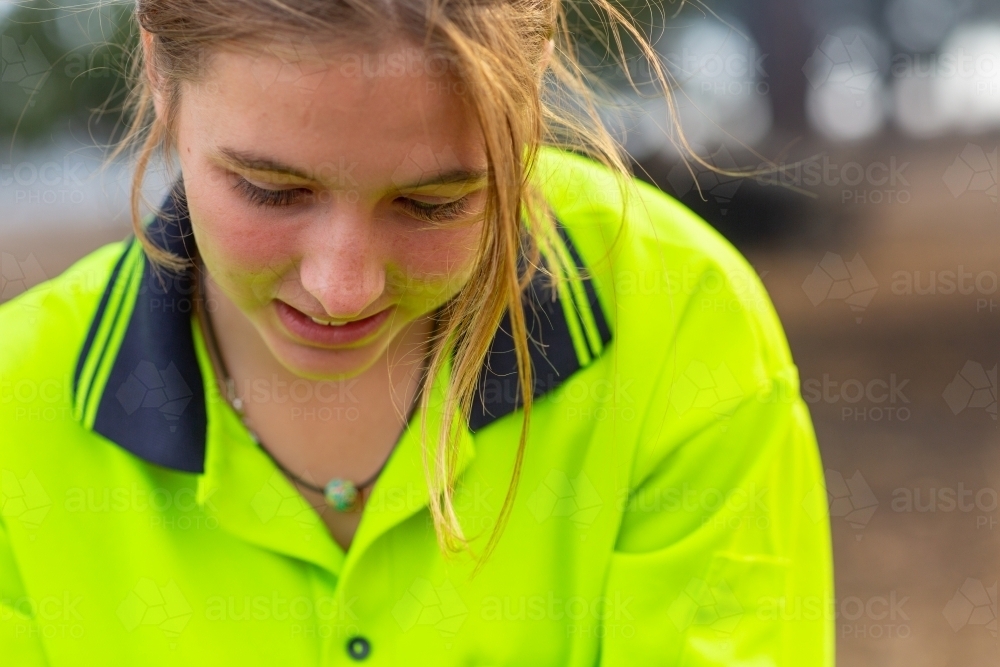 Image of Close up of young woman wearing hi-vis - Austockphoto