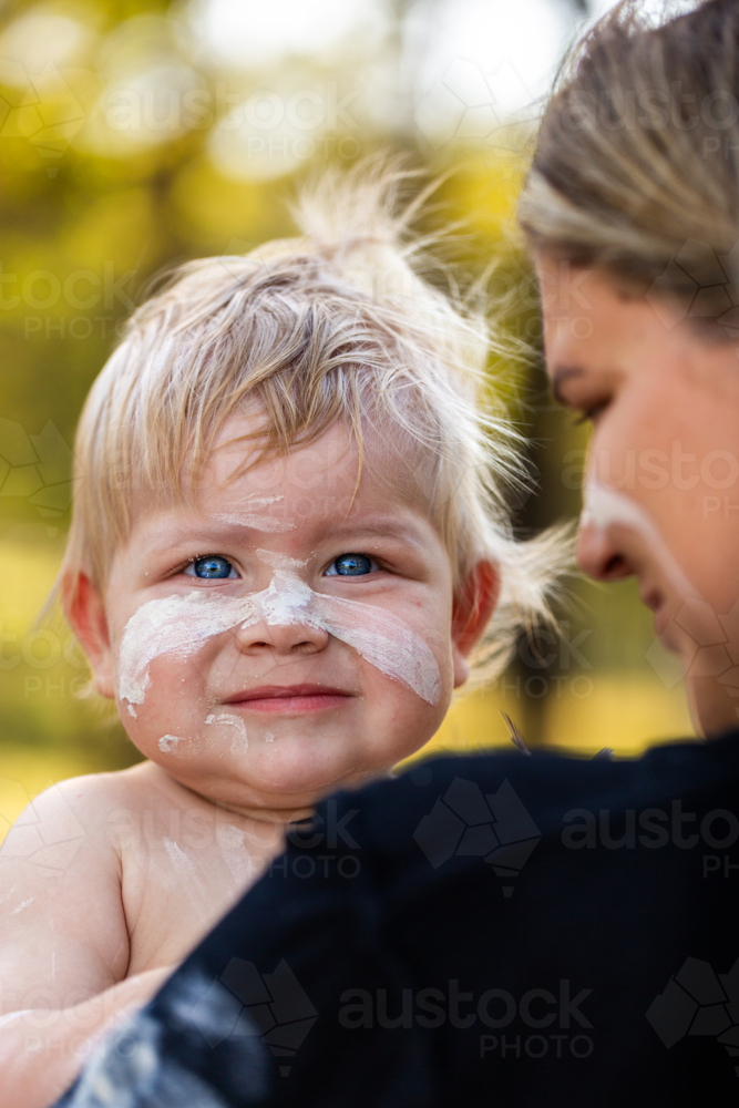 Image of Close up portrait of Aboriginal mum with her baby boy together ...