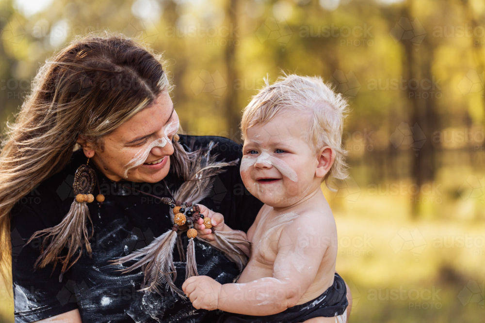 Image of Close up portrait of Aboriginal mum with her baby boy together ...