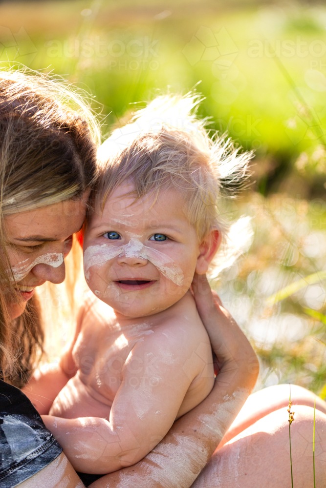 Image of Close up portrait of Aboriginal mum with her baby boy together ...