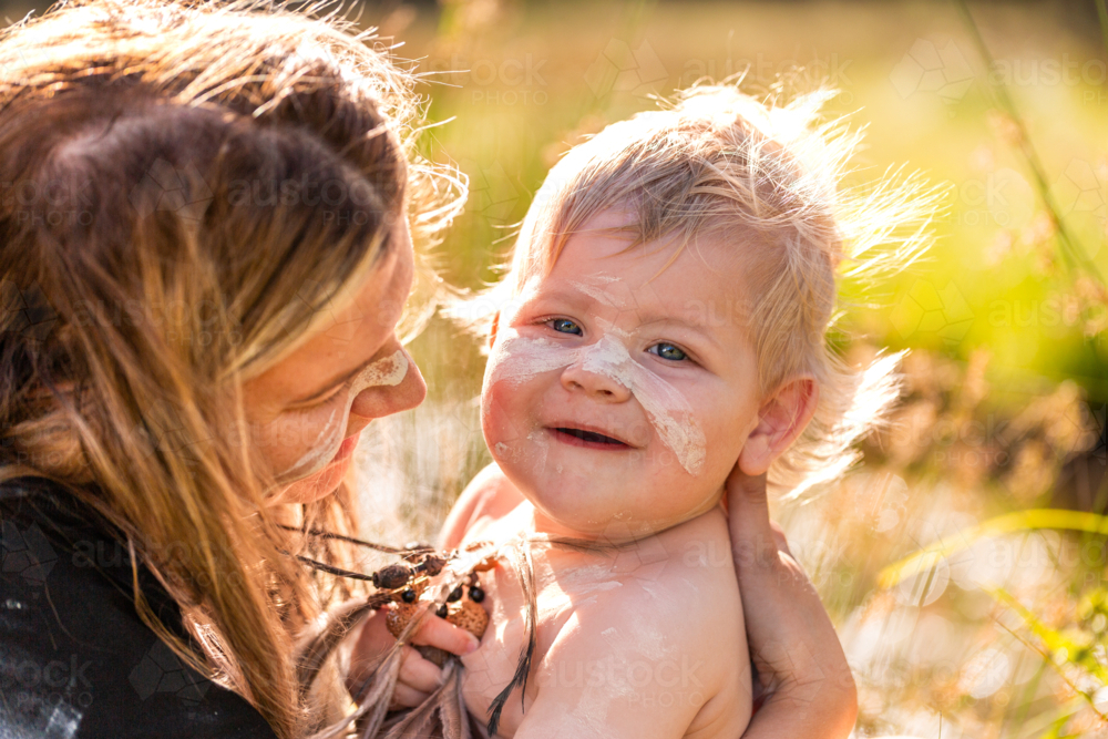 Image of Close up portrait of Aboriginal mum with her baby boy together ...
