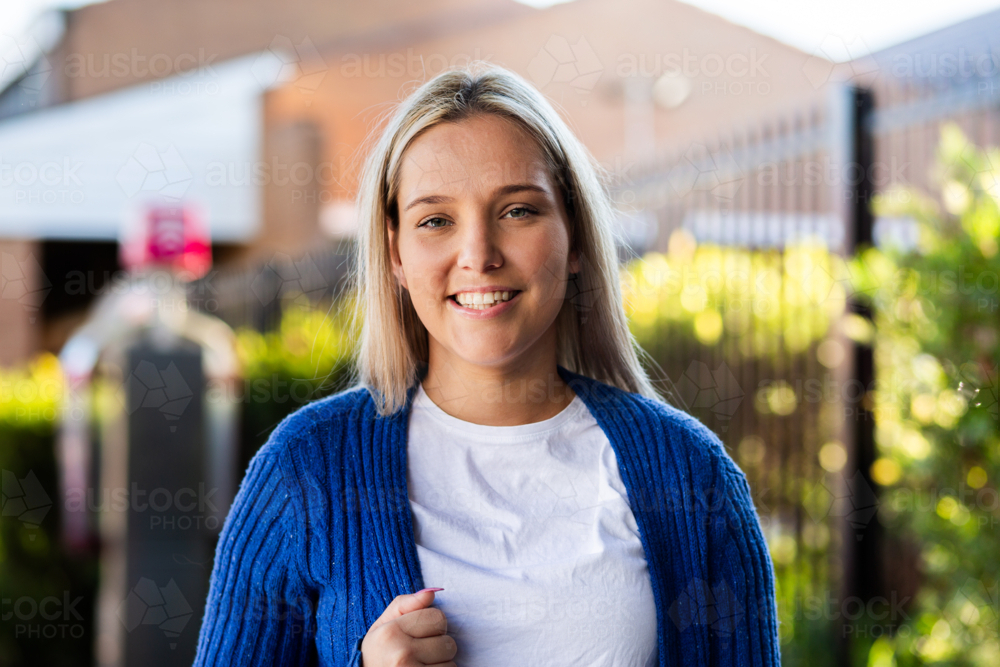 Image of close up portrait of smiling Australian woman in her twenties ...