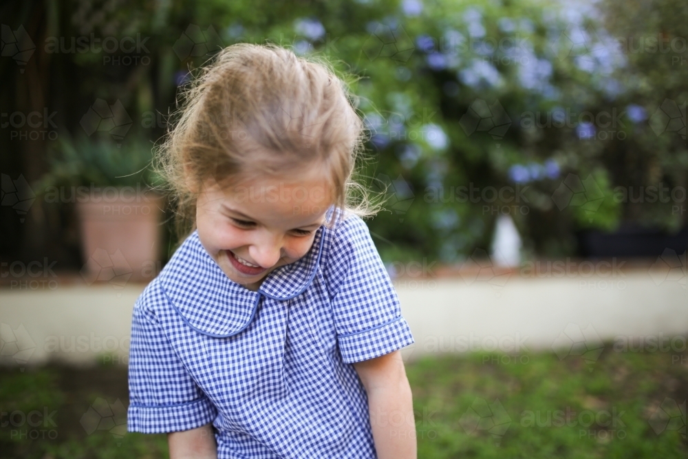 Image of Close up shot of a girl in school uniform - Austockphoto