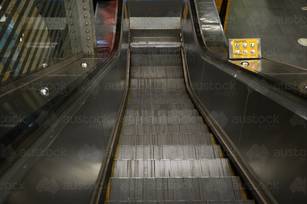 Image of Close up shot of an empty escalator - Austockphoto