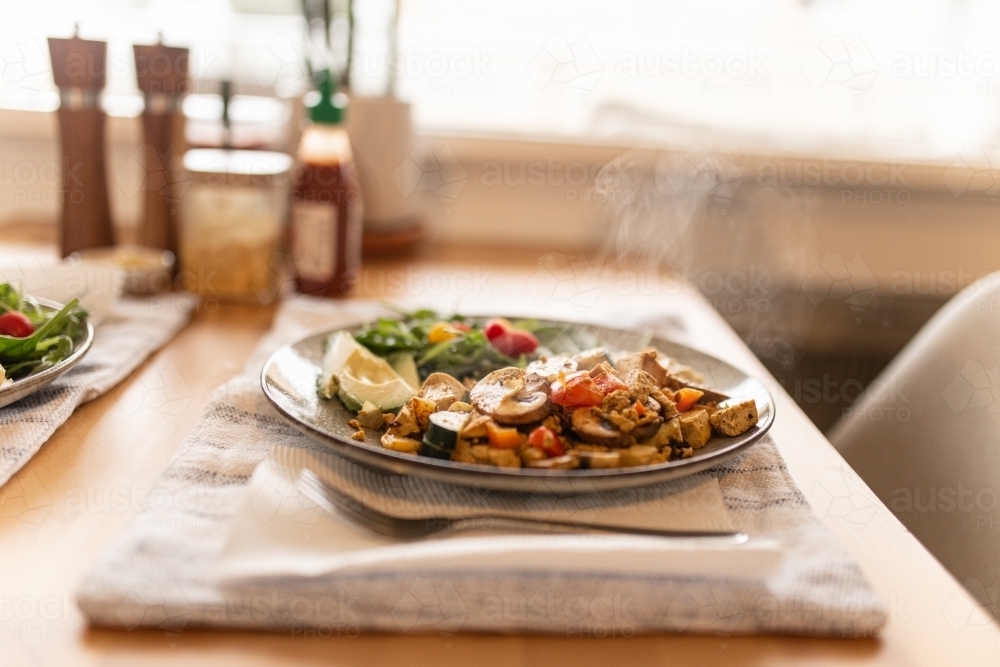 Image of Close up shot of healthy vegetable based meal on kitchen table ...