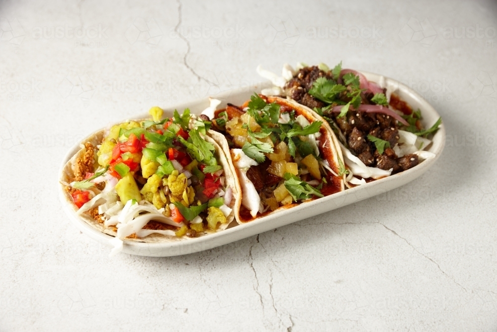 Image of Close up shot of tacos - Austockphoto