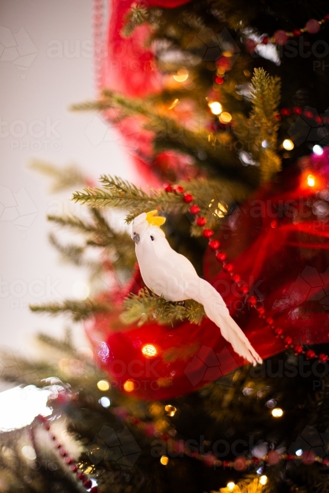 Image of cockatoo decoration on a christmas tree inside - Austockphoto