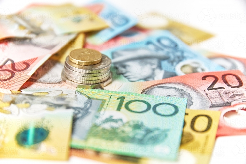 Image of Collection of Australian banknotes and coins stack on a flat ...