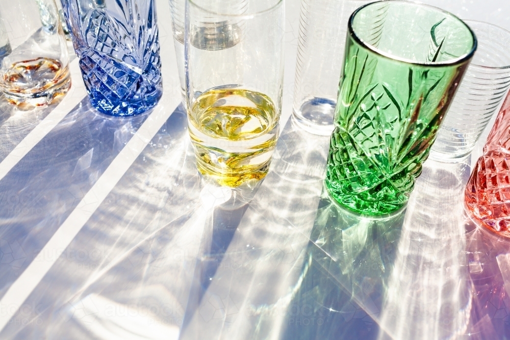 Image of Colour, shadows, light and reflections from glass - Austockphoto