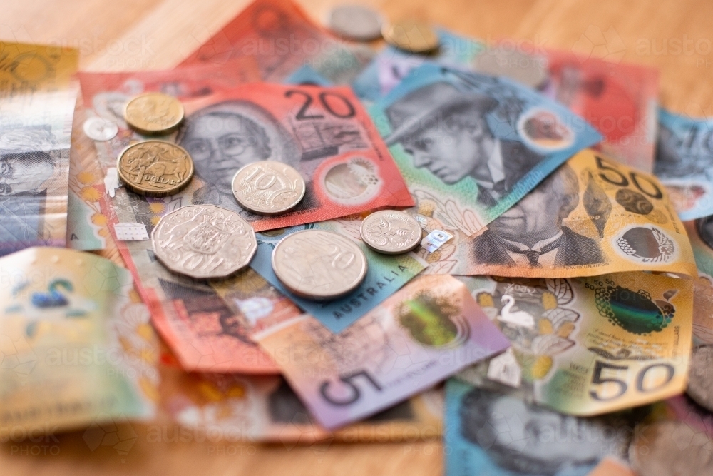 Image of colourful Australian money with one of each coin on top ...