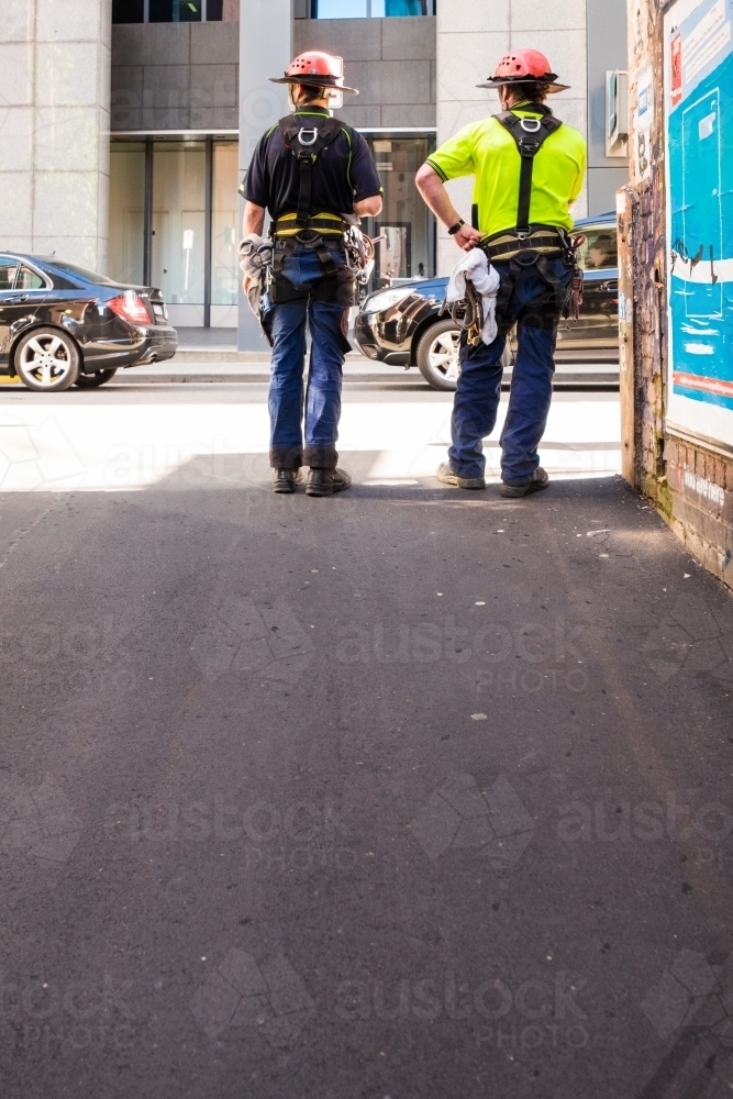 Image of Construction workers in the city - Austockphoto