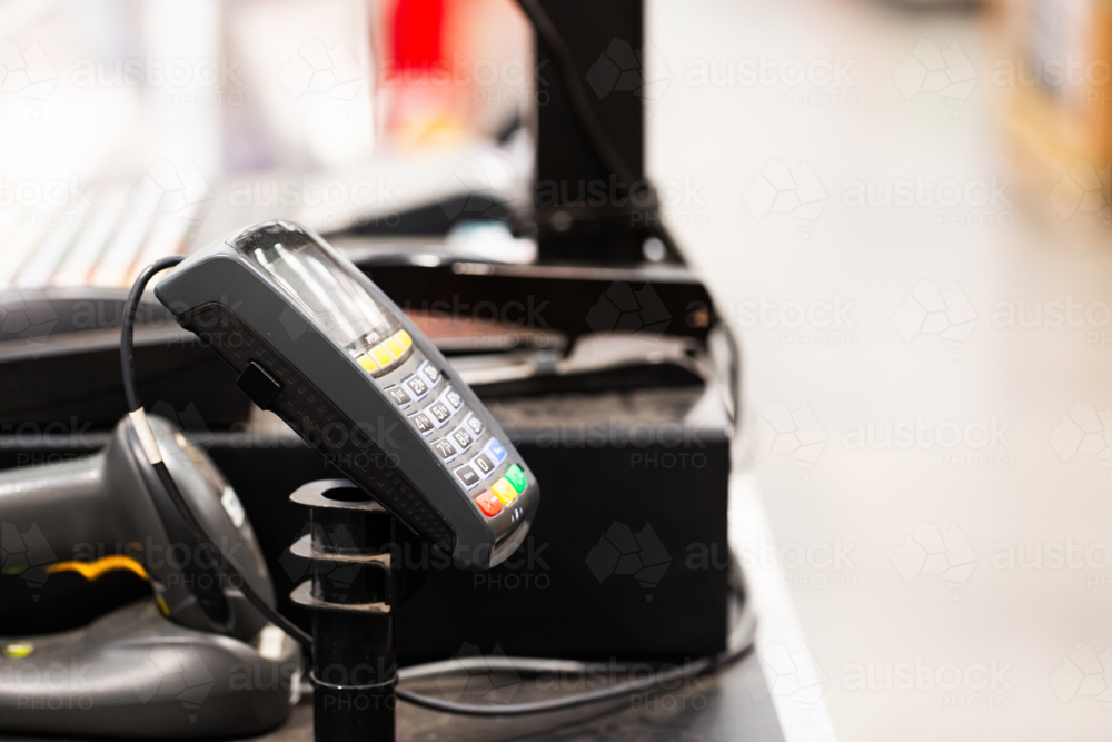 Image of Copy space beside point of sale pin pad card reader at shop ...