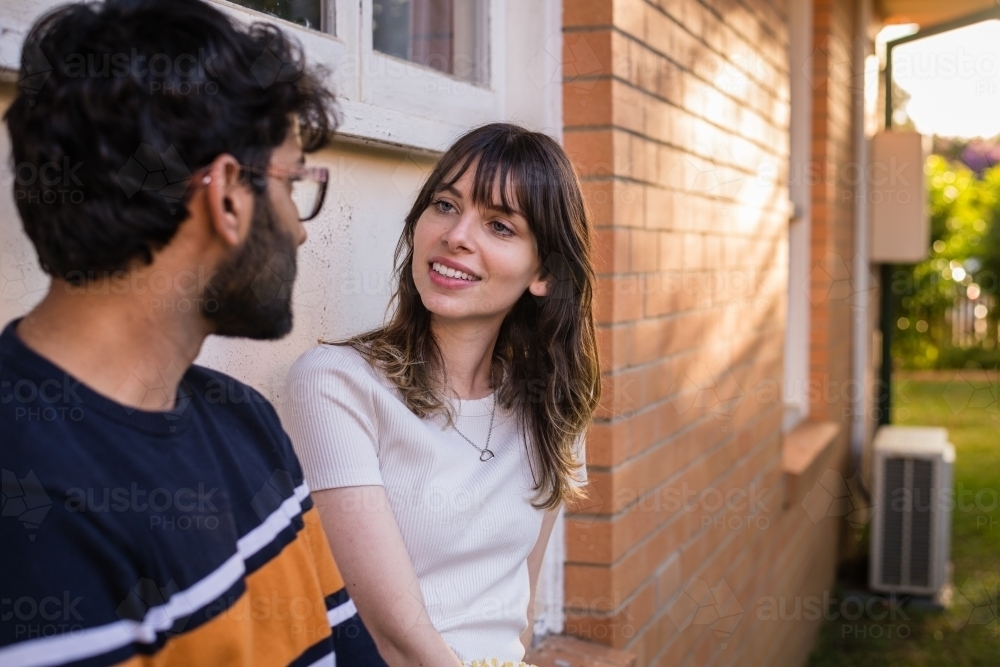 Image of couple in conversation - Austockphoto