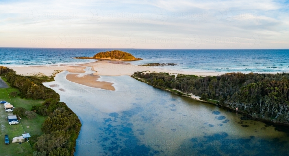 Image of Crampton Island and the outlet of Tabourie creek at dusk ...