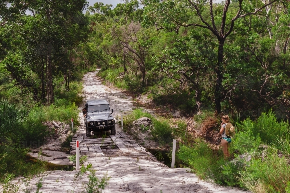 Image of crossing a dodgy bridge on a camping trip - Austockphoto