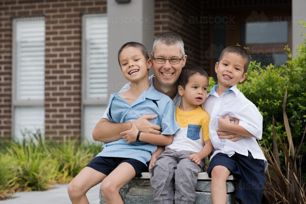 Image of Dad sending his boys off to school on their first day of ...