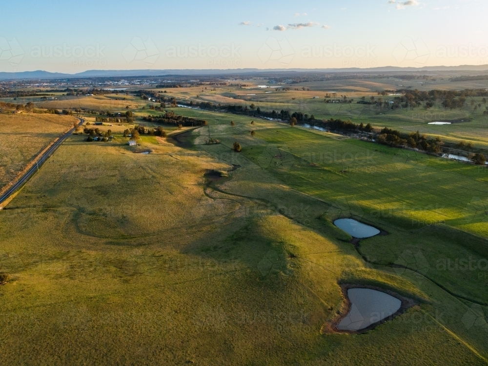 Image of Dams and creek beside Hunter River flowing through green farm ...