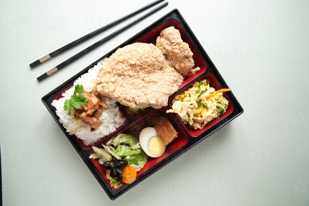 Image of Deep fried pork chop bento - Austockphoto