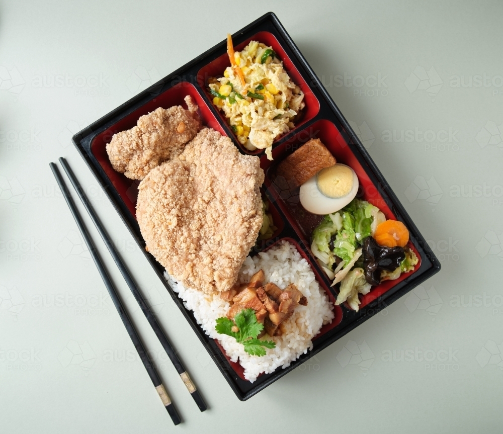Image of Deep fried pork chop bento - Austockphoto