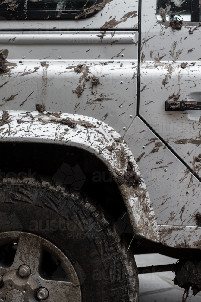 Image of Detail of a four wheel drive car splattered with mud ...